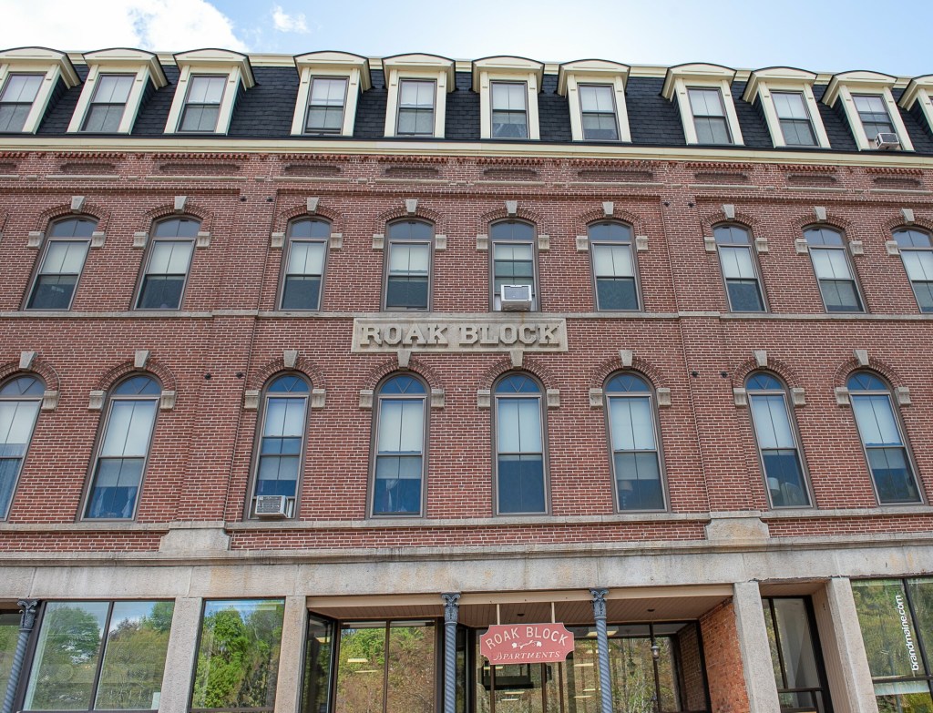 Four COVID-19 cases at Roak Block apartments in Auburn