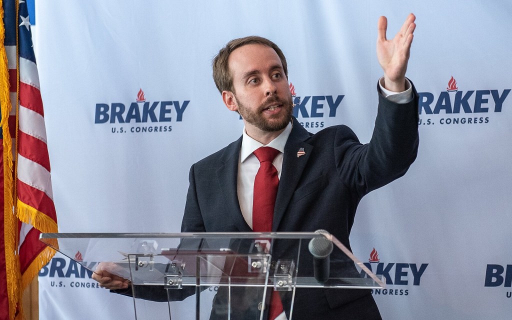 Maine Republican congressional candidate Eric Brakey giving away an AR ...