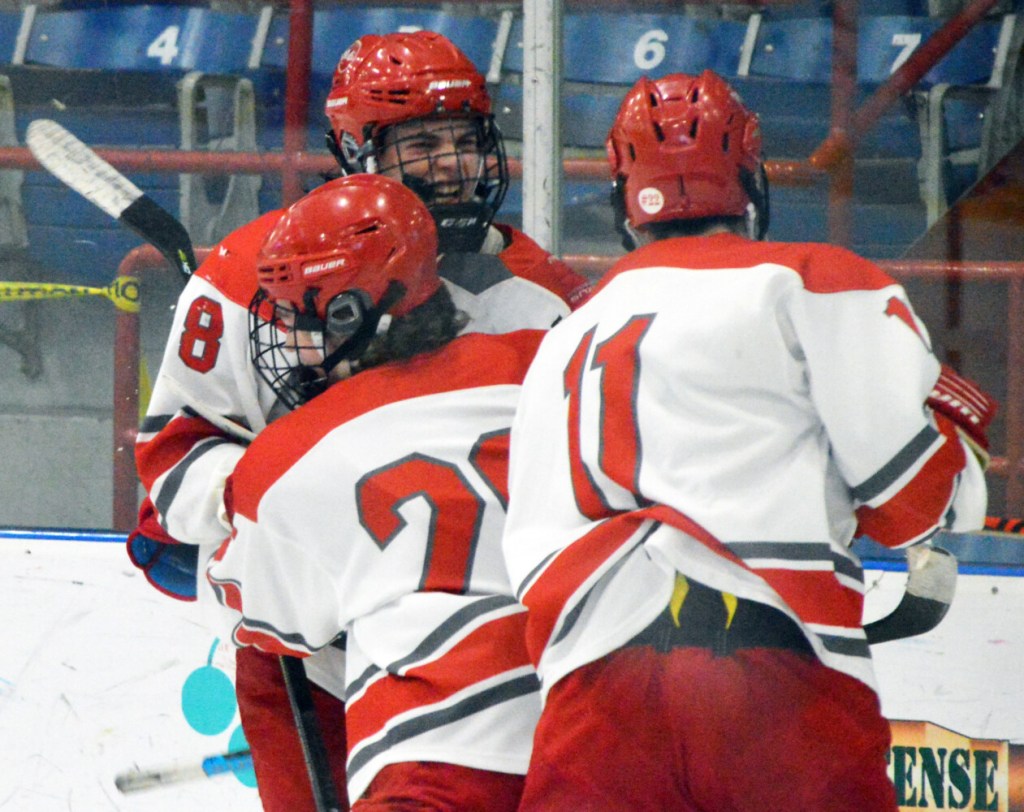 Boys Class A Hockey: Red Riots find a way past Golden Trojans, 5-4