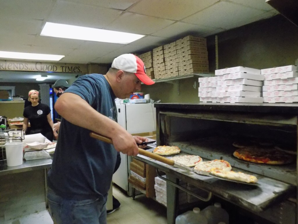 My Dad’s Place reopens to give away 454 pizzas to boost community ...