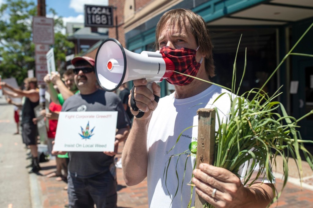 Marijuana activists target large provider’s legal challenges