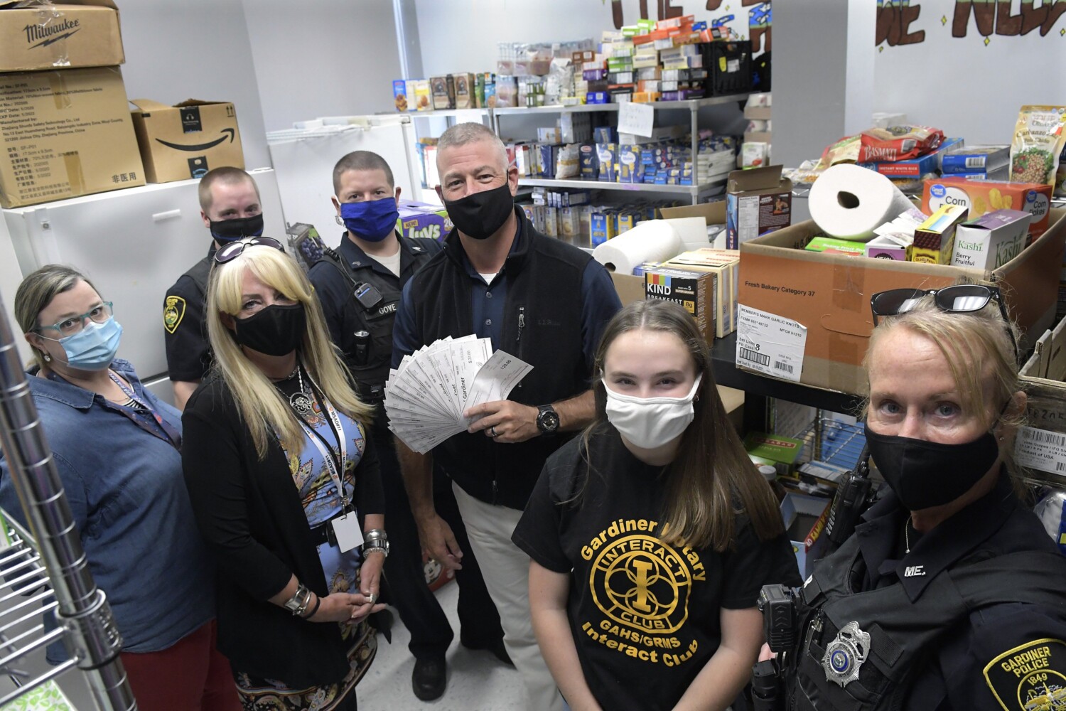 Gardiner police donation helps lift Tiger Food Pantry