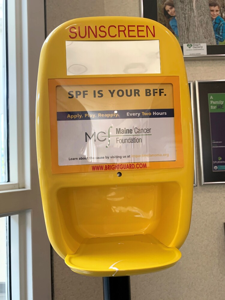 Sunscreen dispensers at the ready in Old Orchard Beach