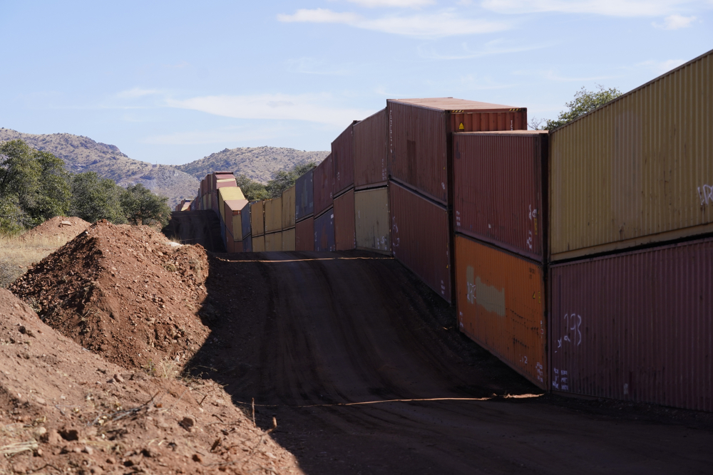 Arizona governor stacks containers on border at term’s end