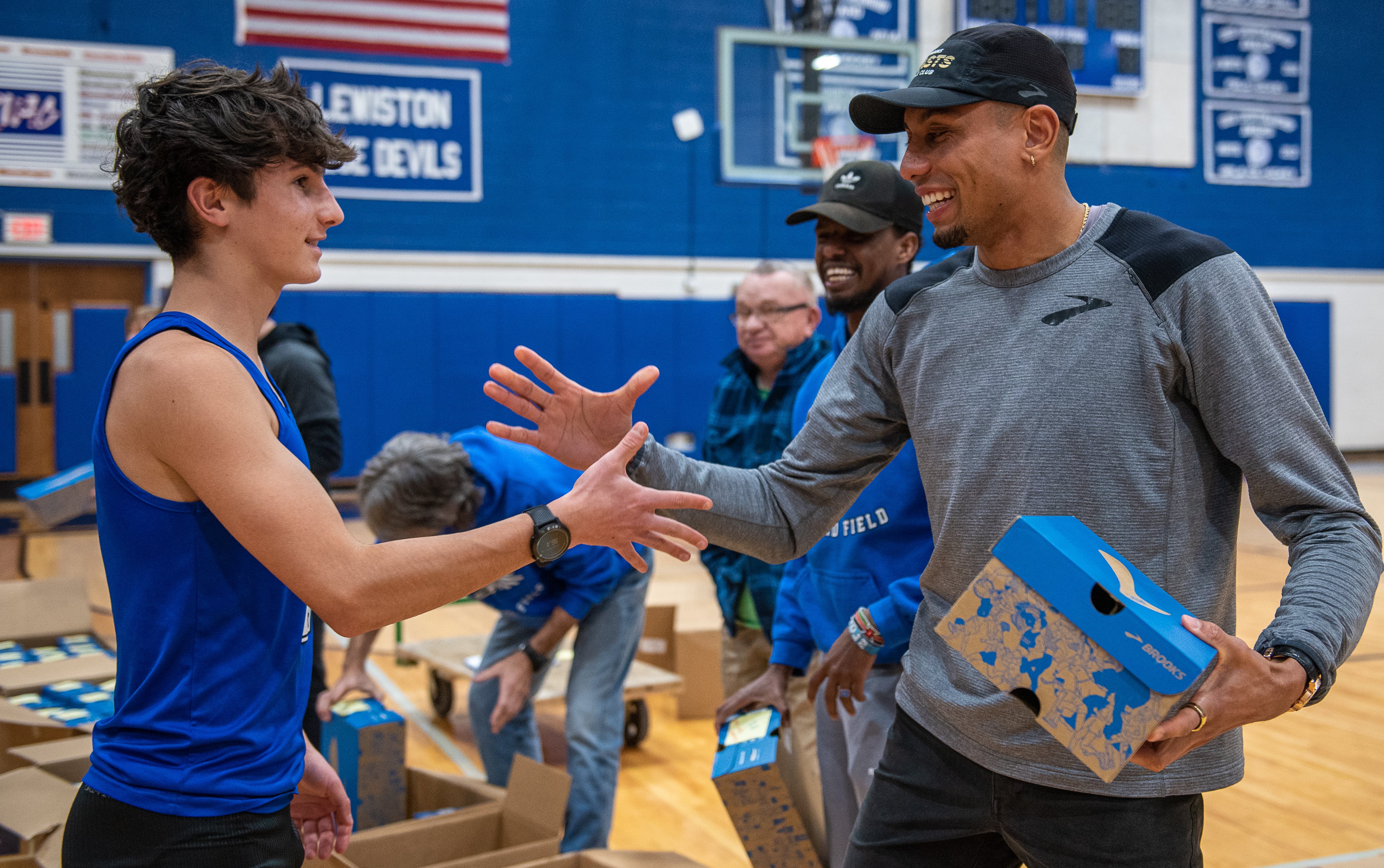 Isaiah Harris visits Lewiston High School to donate shoes to track team ...