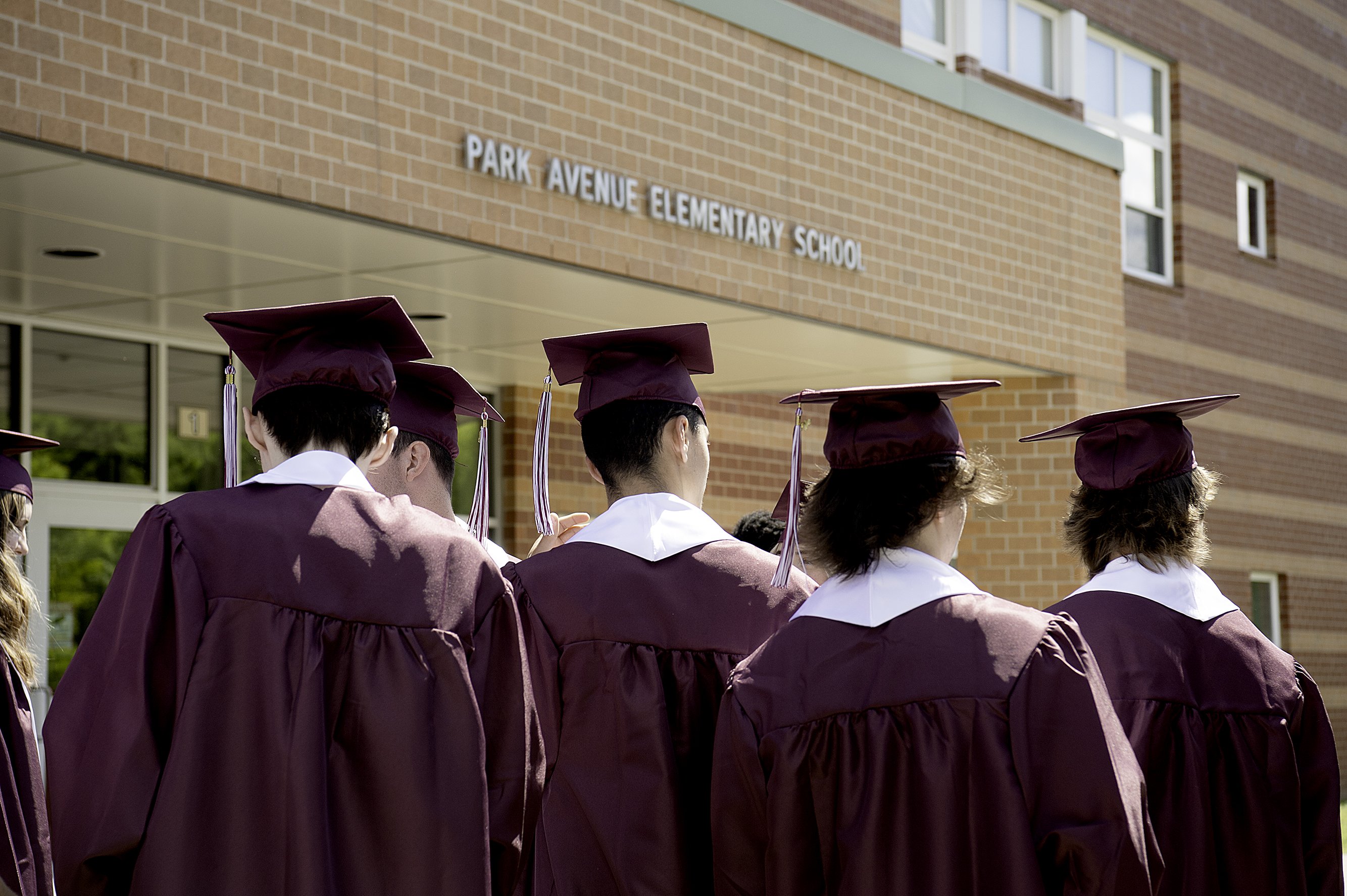 Photo Album: Edward Little High School graduates walk through the halls ...