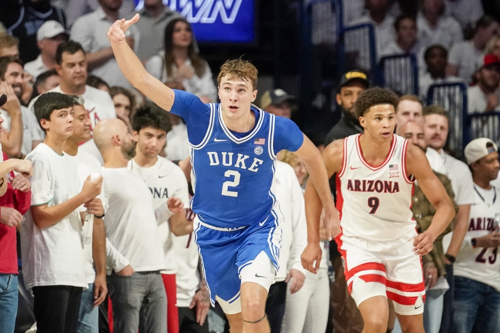 Cooper Flagg shines in first big road game as Duke beats Arizona