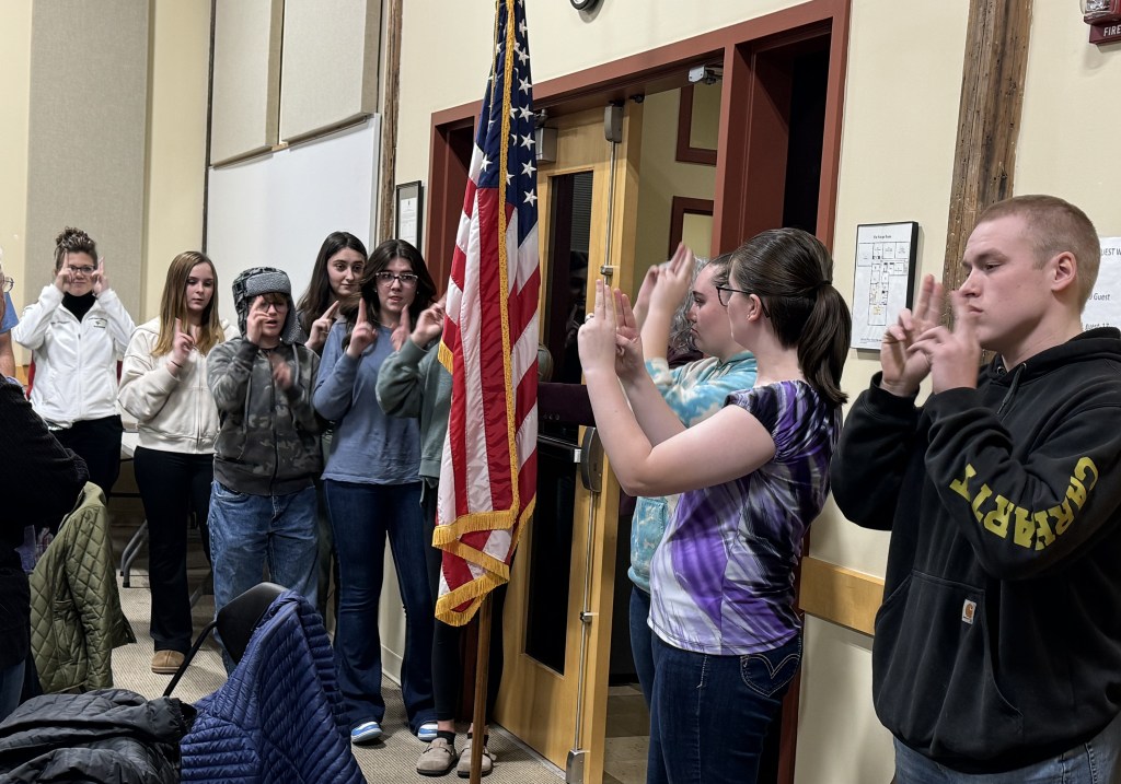 Photo: Oxford Hills students recite Pledge of Allegiance using sign ...