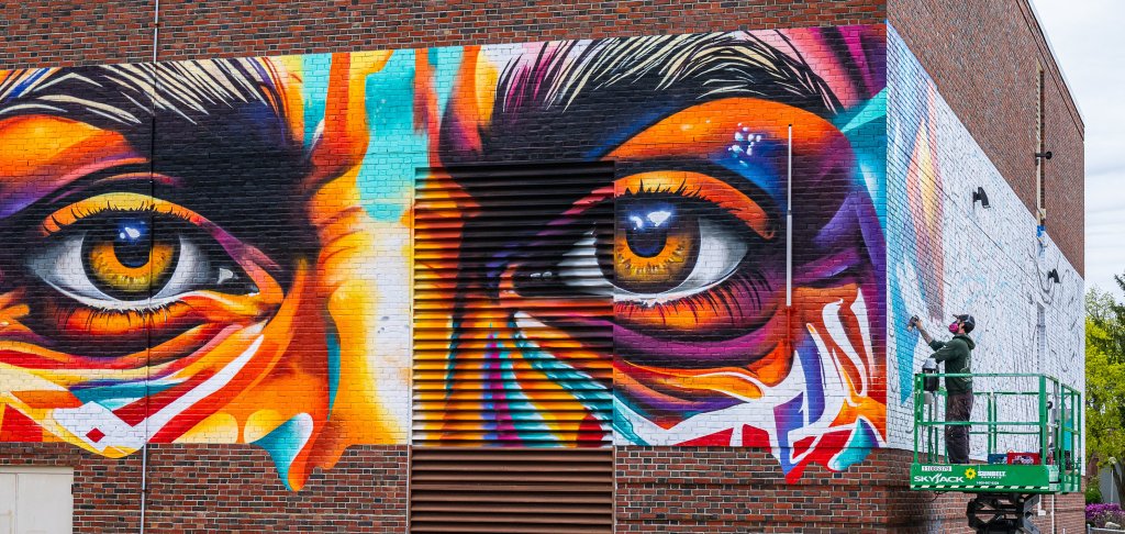 The Color Wizard begins work on another mural in Lewiston