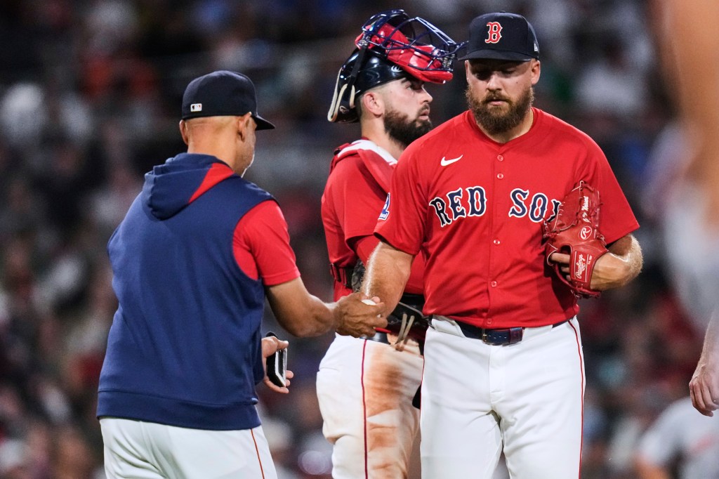 Reds rally to beat Red Sox after losing completion of suspended game