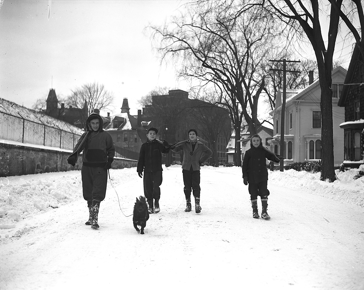 Historical photos depict snow-covered Portland in the 1940s and ’50s