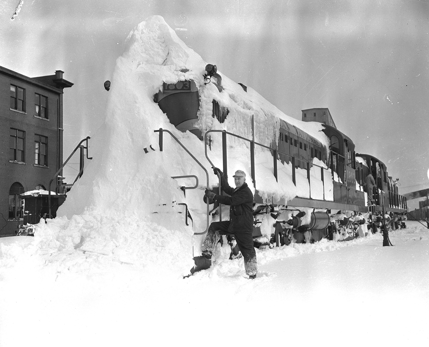 Historical photos depict snow-covered Portland in the 1940s and ’50s