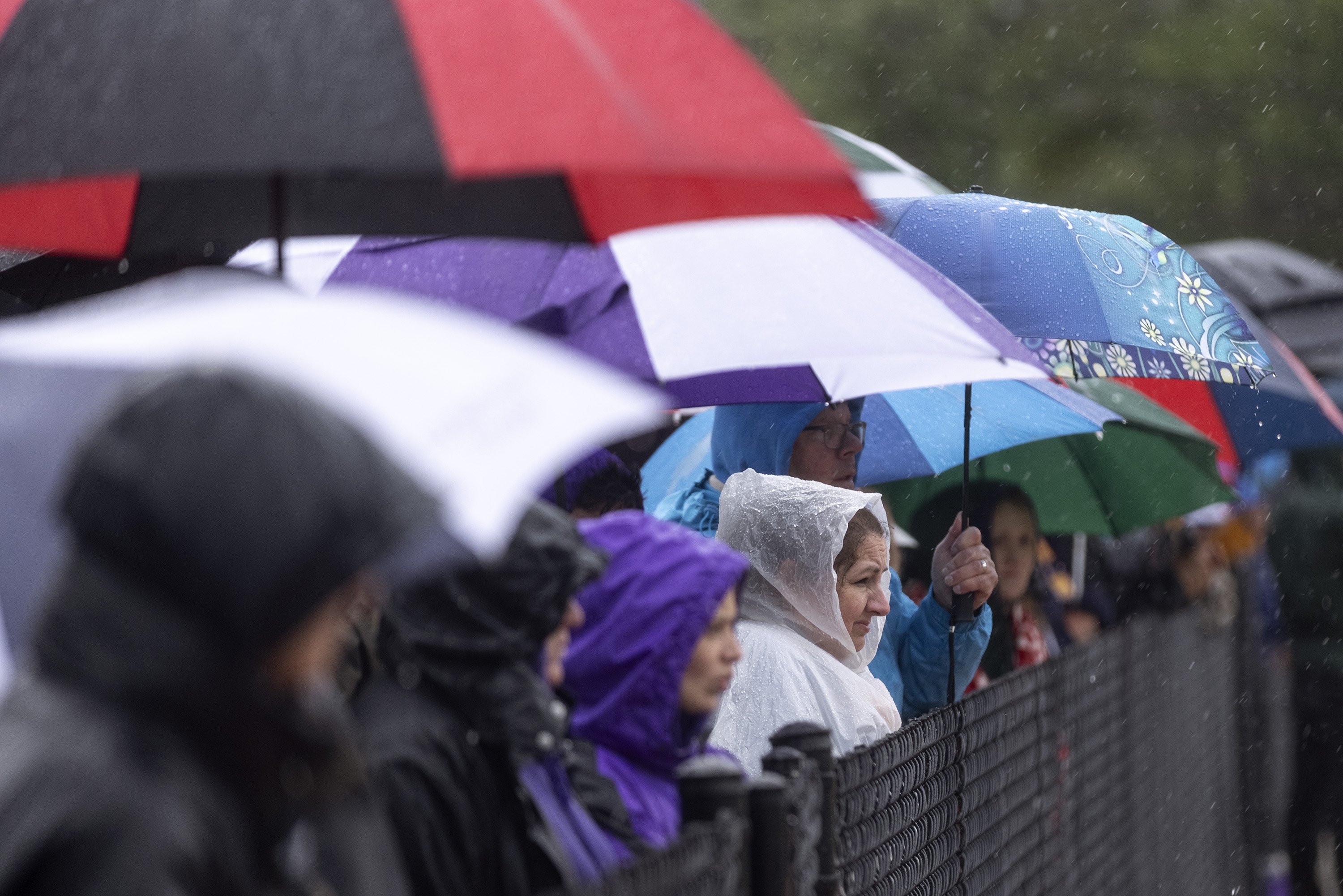 In photos: Athletes pour it out at rainy track and field championships